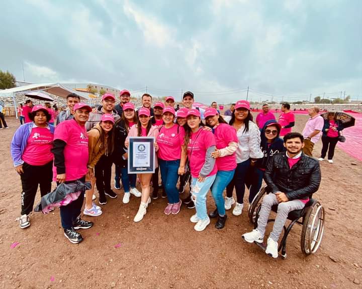 Con récord del moño rosa una mujer de la capital será beneficiada ...